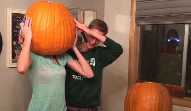 Daughter Gets Head Stuck in Pumpkin While Mum Films Family Pumpkin Carving